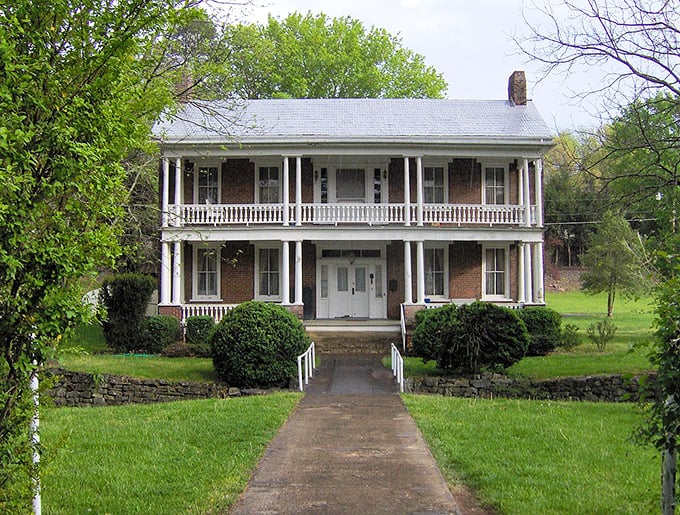 The Cunningham-Clayton House: Southern charm personified in brick and mortar. It's the architectural equivalent of a warm hug and a glass of sweet tea.