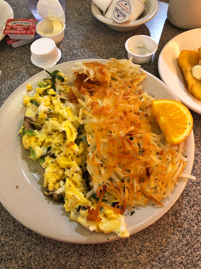 Breakfast artistry in action! This colorful plate is like a Jackson Pollock painting, but way more delicious.
