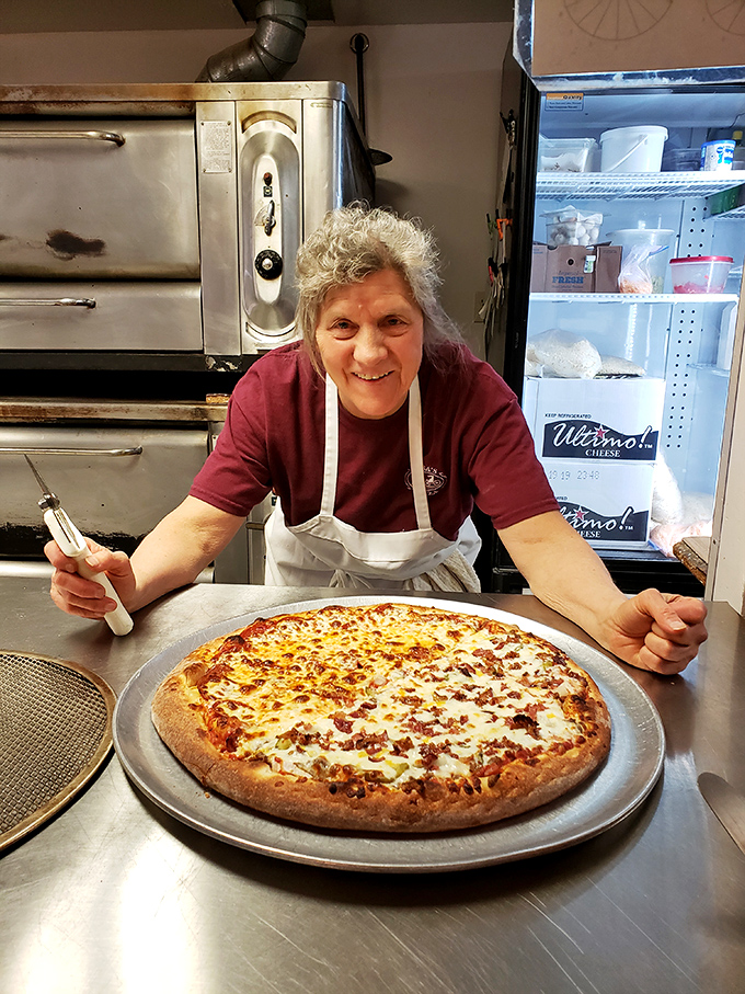 Meet the maestro behind the magic! Rosa's pizza makers don't just toss dough; they orchestrate symphonies of flavor right before your eyes.