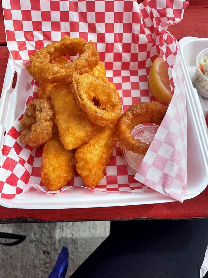 Crispy, golden rings of joy nestled next to fish that's fresher than a stand-up comedian's material. It's a plate of happiness, Alaskan style.