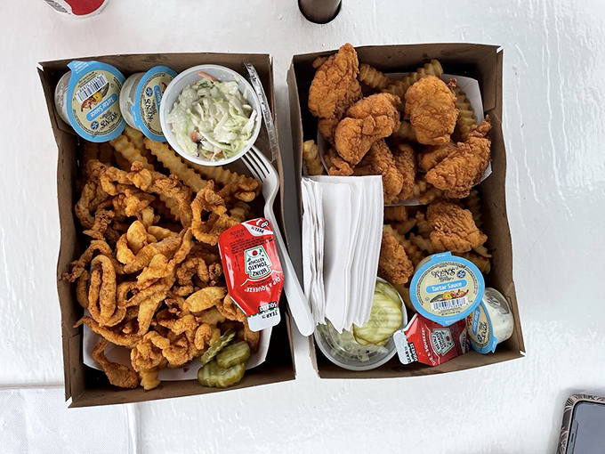 Talk about a seafood smorgasbord! This box is like a treasure chest of crispy, golden delights from the deep.