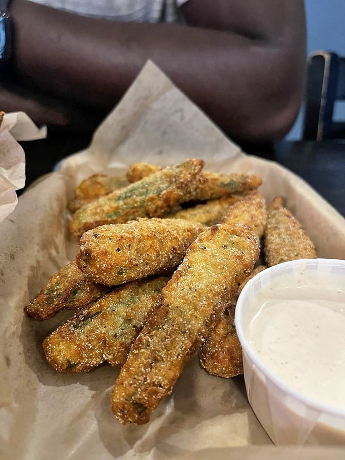 Fried okra: the South's gift to the world. These golden nuggets are crunchier than your old Walkman cassettes.