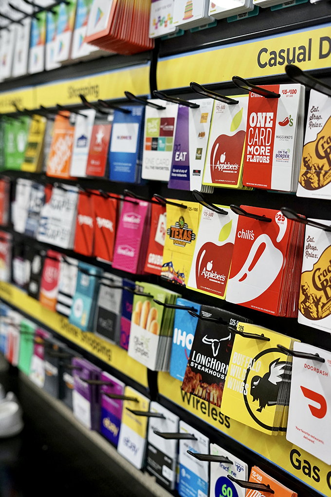 A wall of possibilities! These gift cards are like keys to a kingdom of experiences, all within arm's reach and budget.