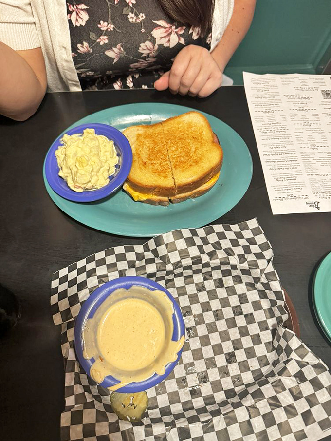 Grilled cheese perfection! Golden, crispy, and oozing with cheesy goodness &ndash; it's comfort food that hugs your soul.