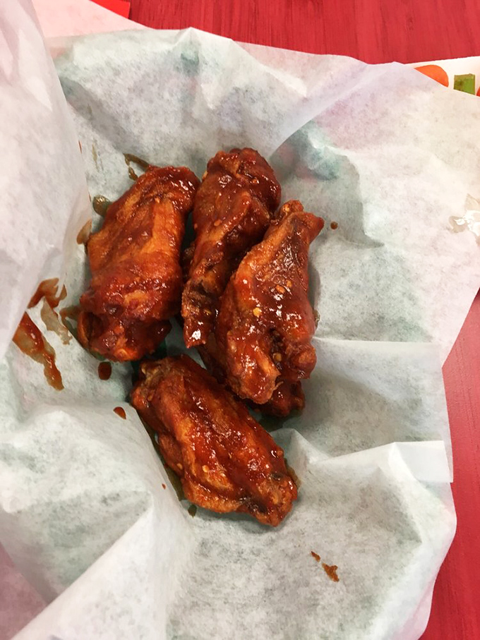 Hot wings that bring the heat and the sweet. They're like a spicy hug for your mouth.