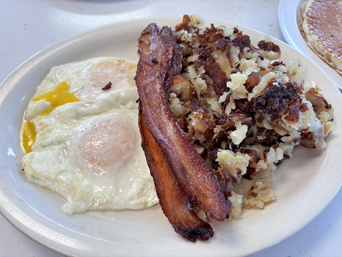 The "House Special" &ndash; where eggs, hash browns, and toast unite in a breakfast symphony that would make Mozart jealous.