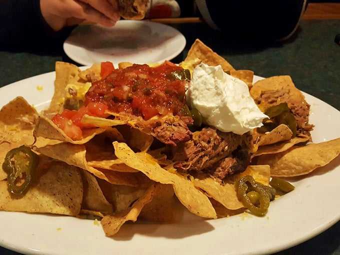 Nacho average appetizer! This mountain of chips, cheese, and barbecue goodness is the Everest you'll actually want to conquer. Bring friends &ndash; or don't. We won't judge.