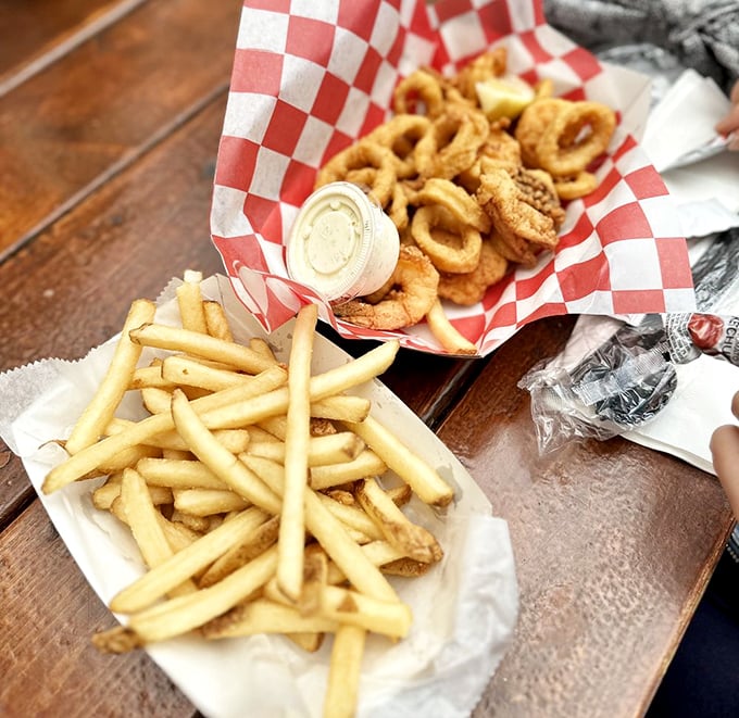 Ahoy, seafood lovers! The Skipper's Platter is a boatload of crispy, golden goodness. Captain's orders: dig in and enjoy!