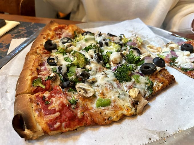 Pizza that's not afraid to show its veggie side! This pie proves that sometimes, the best toppings come straight from Mother Nature's cookbook.