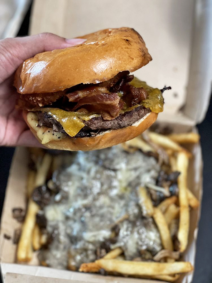 Wagyu burger alert! This isn't just a burger, it's a work of art. Michelangelo had his David, La Tour has this beefy masterpiece.