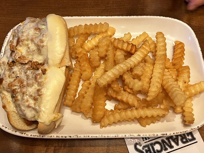 Grinder, meet taste buds. Taste buds, prepare for liftoff! This sandwich and its crispy sidekicks are about to take you on a flavor adventure.