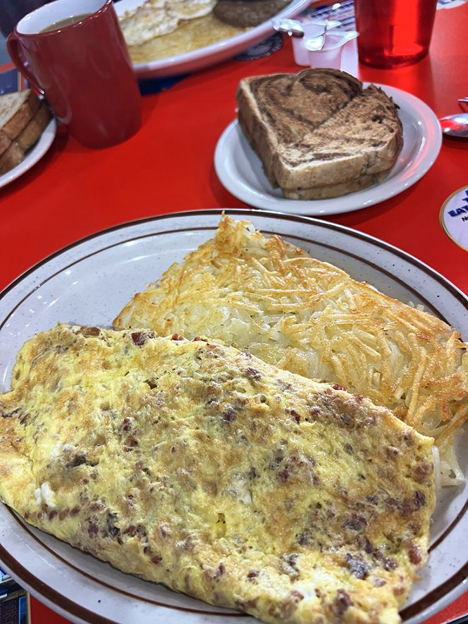 Omelette you finish, but this might be the best breakfast of all time! Packed with goodies and paired with crispy hash browns, it's a plate of pure morning magic.