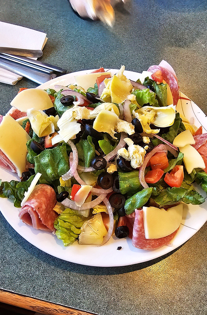 An antipasto salad that's a United Nations of flavors. It's like a party in a bowl, and everyone's invited!