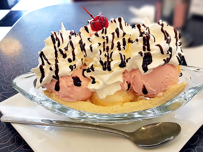Behold the banana split in all its glory! This isn't just dessert; it's a childhood dream come true on a plate.