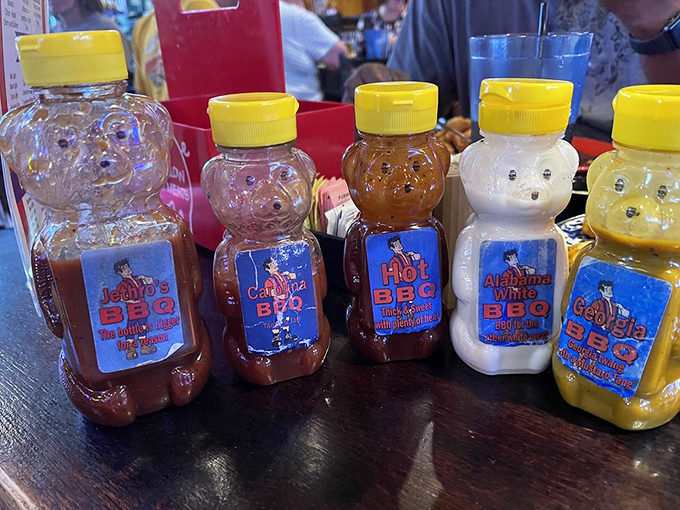 The United Nations of BBQ! These sauce bottles are like tiny flavor ambassadors, each one promising a unique journey for your taste buds.