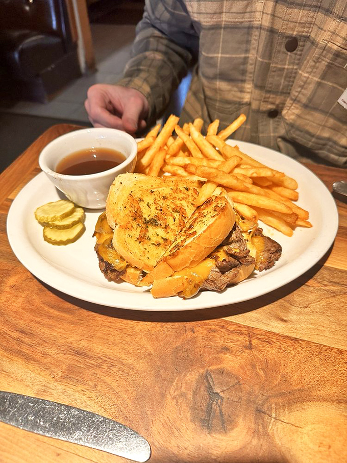 Bonnie's dip isn't just a meal, it's a meaty masterpiece! This slow-roasted beef sandwich is so juicy, you might need a life preserver to navigate through it.