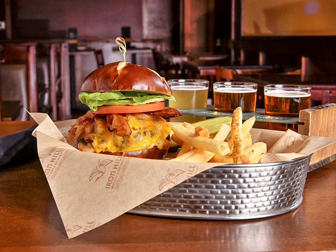 A burger so photogenic it deserves its own social media manager, served in a basket that says, "Yes, this is exactly what you hoped it would be."