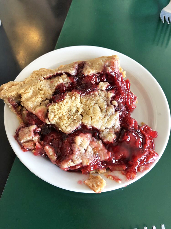 Cherry pie perfection! This crumbly, gooey slice of heaven would make Agent Cooper swoon with delight.