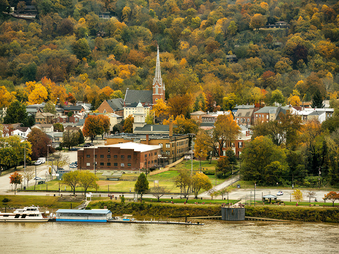 Fall foliage frames Madison's church spires and historic buildings, creating a scene so perfectly autumnal it belongs on a Thanksgiving greeting card.