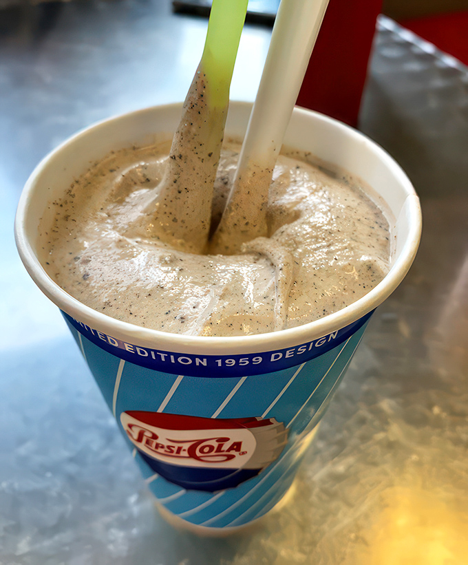 Shake it up, baby! This Cookies n' Cream milkshake is so thick, you might need a spoon. Or a shovel. Either way, dig in!