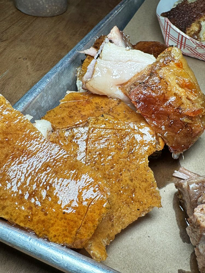 Pork belly so crispy, it could double as a xylophone. But trust me, you'll want to eat it, not play it.