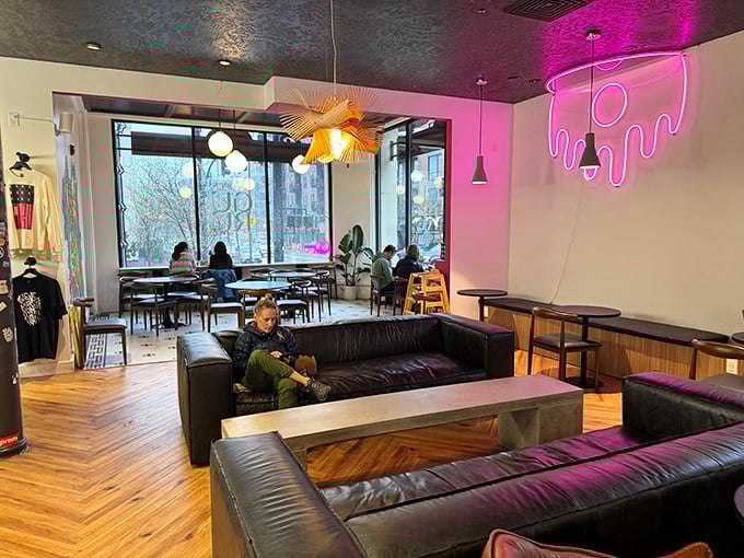 Guru Donuts: where strangers become friends over shared sugar highs and coffee-fueled conversations. It's like a tasty United Nations in here.