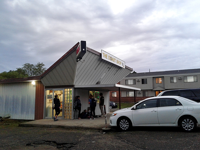 Where the magic happens. These dedicated staff members are the unsung heroes of Pierre's morning rush, serving up smiles and donuts.