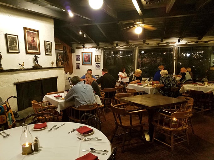 Happy diners in their natural habitat! This cozy corner of the restaurant is where memories are made, one juicy bite at a time.