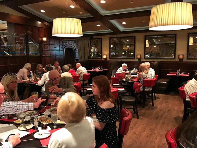 A dining room buzzing with the happy hum of good food and great company. It's like Thanksgiving, but with better seating arrangements.