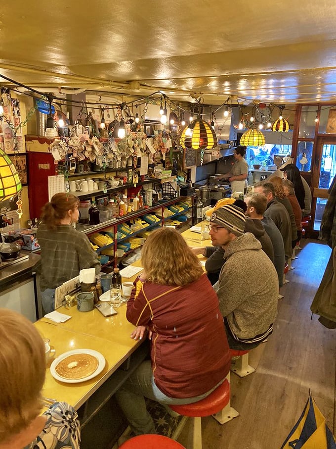 Elbow-to-elbow eating: where strangers become friends over shared syrup and coffee refills.