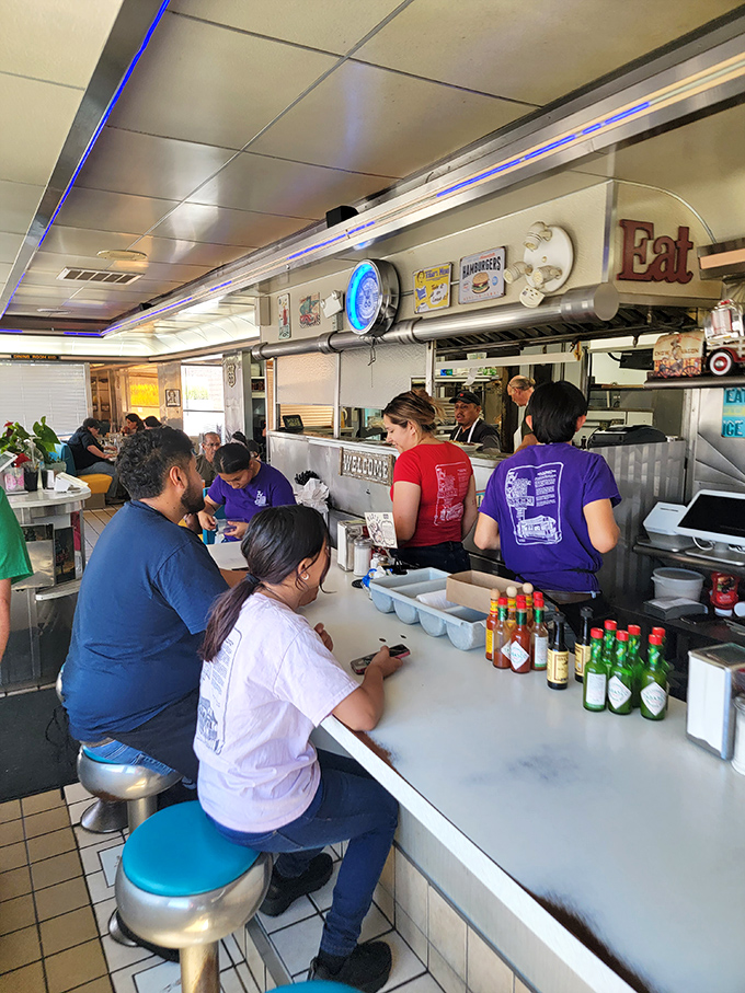 Breakfast is served! These happy diners are living proof that the early bird gets the waffle... and maybe a side of bacon too.