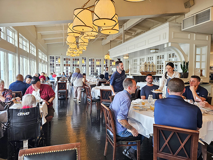 Happy diners, ahoy! This bustling scene is like a Norman Rockwell painting, but with better seafood.
