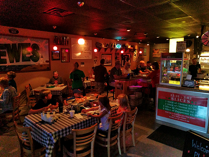 Pizza brings people together! This lively scene captures the essence of Mr. P's - good food, good company, and good times.