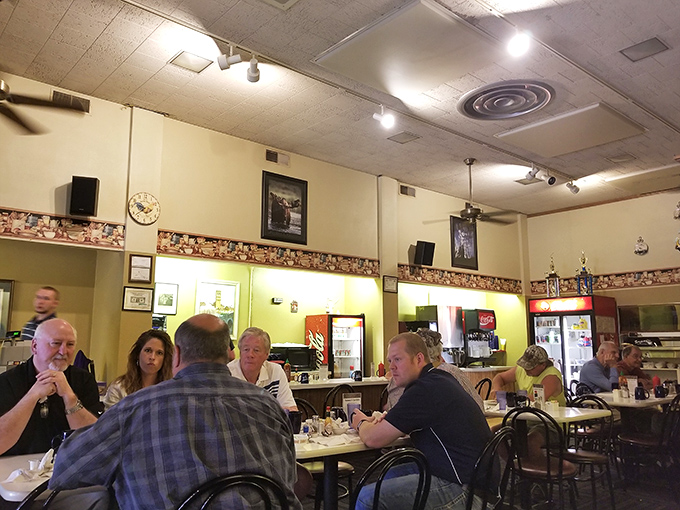 Where strangers become friends over shared love of good food. It's like a real-life version of "Cheers," but with more bacon.