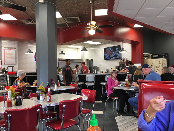 Happiness is a full diner and a full plate. This bustling scene is like a Norman Rockwell painting come to life, with extra syrup on the side.