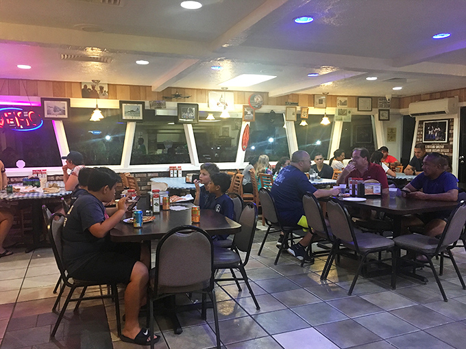 Pizza night done right! These happy diners prove that good food and good company are the secret ingredients to life's best moments.