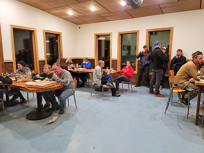 Where strangers become friends over slices. It's like a United Nations summit, but with better food.