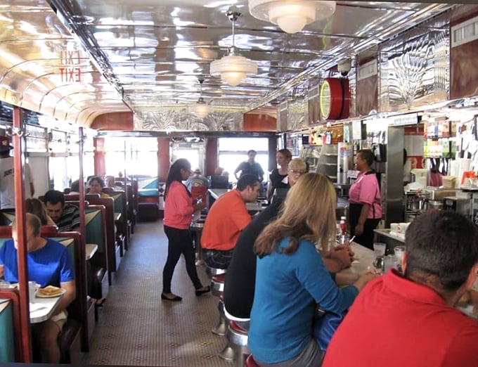 Where strangers become neighbors and calories don't count. This diner's serving up community spirit alongside those legendary waffles.