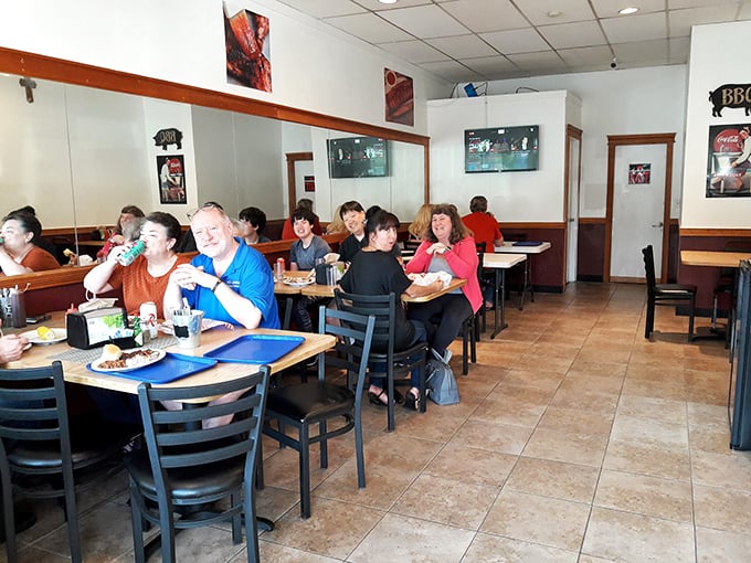 Happy diners lost in meaty bliss. This scene is the BBQ equivalent of a group hug &ndash; warm, inviting, and guaranteed to leave you feeling good.