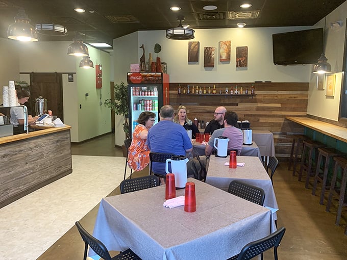 Happy diners, checkered tablecloths, and the promise of biscuits. It's the breakfast trifecta we all need in our lives.