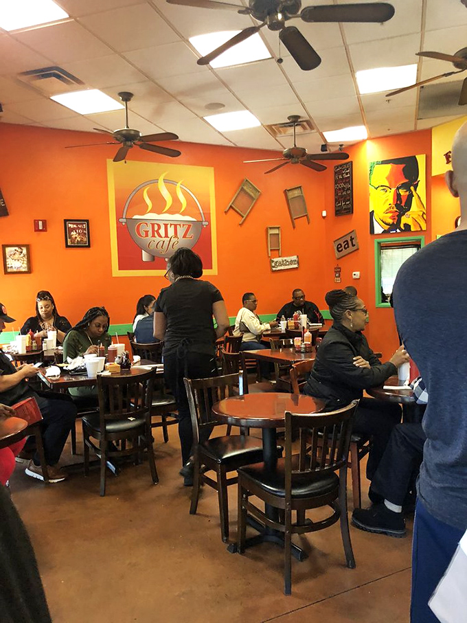 A full house is a happy house! These diners know they've struck gold – or should we say, struck grits? The buzz of satisfaction is almost audible.