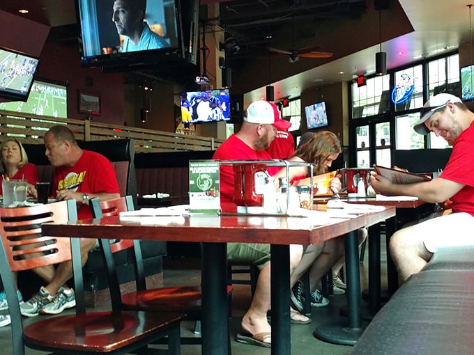 Where sports fans come to cheer, eat, and occasionally wear their meal. It's a full-contact spectator sport with napkins.