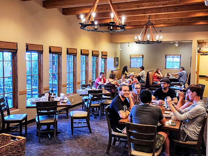 Happy diners, lively conversation, and the promise of good food. This scene is like a Norman Rockwell painting, but with better BBQ.