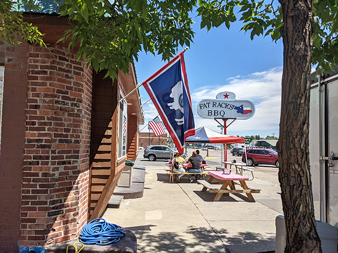 The Texas flag flies proudly outside, a beacon for barbecue pilgrims. Those picnic tables have heard more food moans than a Hollywood sound stage.