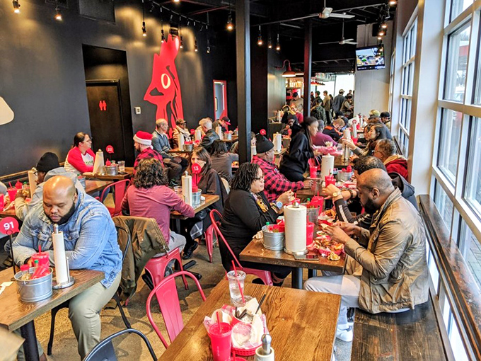 Happiness is contagious! The diverse crowd at Hattie B's proves that great food brings people together like nothing else.