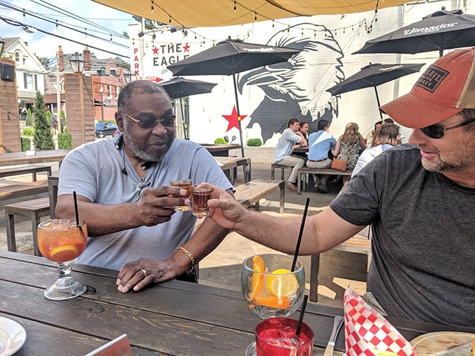 The outdoor patio at The Eagle isn't just a dining space&mdash;it's Louisville's ultimate spot for bourbon toasts and shared plates.