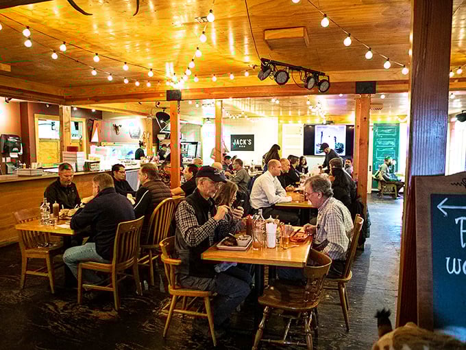A full house of happy diners gathered under string lights &ndash; the universal sign that good food has brought people together.