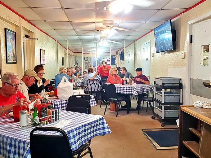 A slice of Americana, served hot and fresh. These diners aren't just eating; they're participating in a time-honored tradition of community.