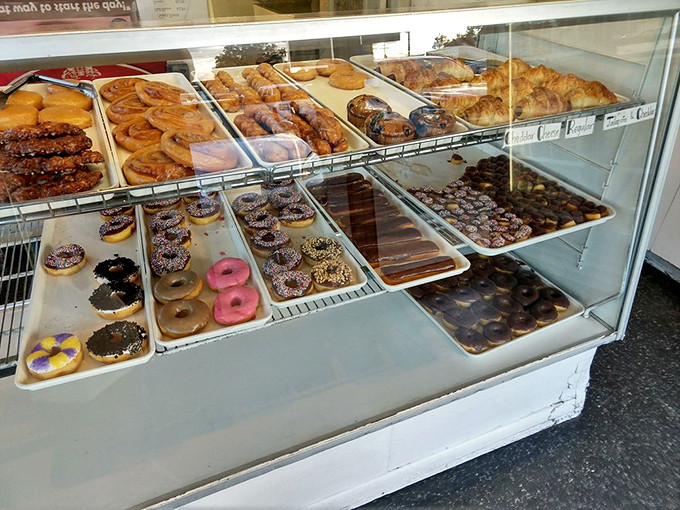 Donut decision paralysis? It's real, folks. This display case is a choose-your-own-adventure book, but every ending is delicious.