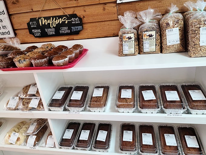 Muffins and breads line these shelves like soldiers of satisfaction, each package containing the antidote to a bad day or empty stomach.